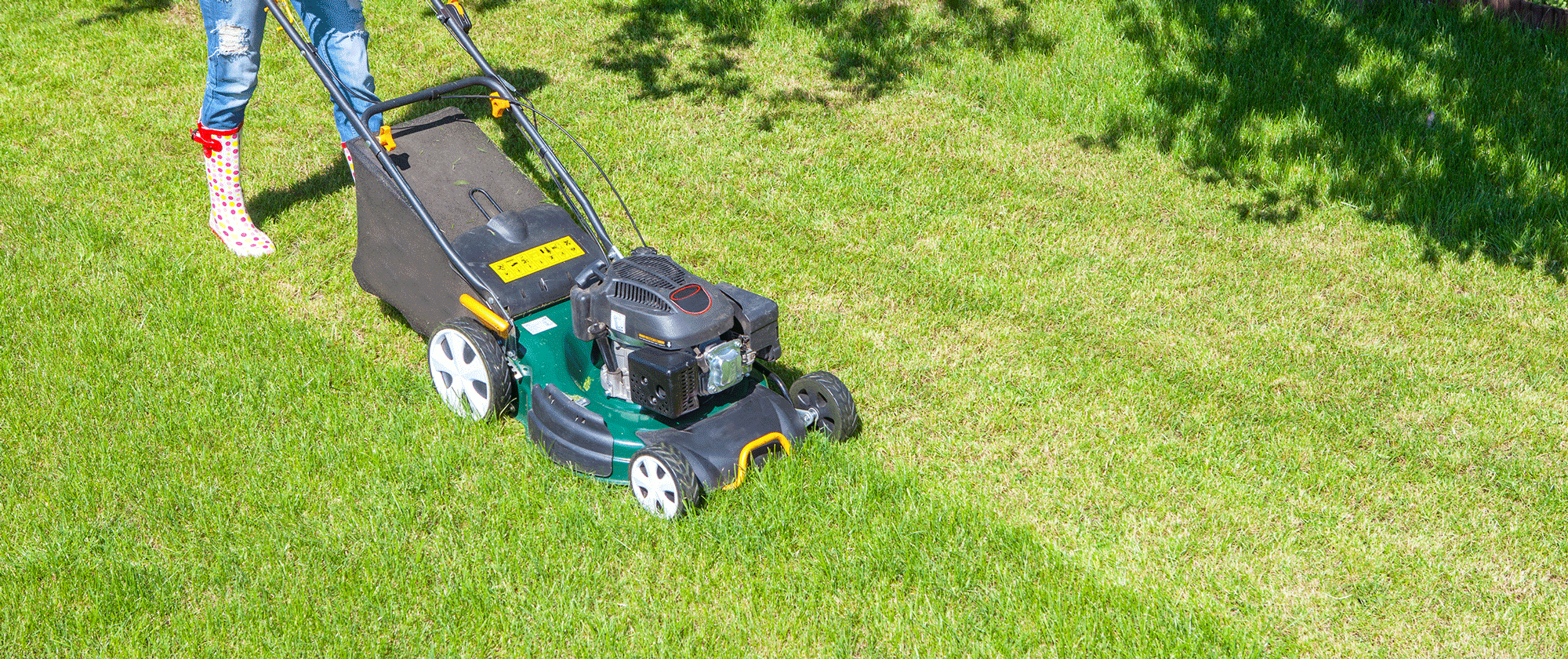 MTF_woman_mowing_lawn - Motz Turf Farm